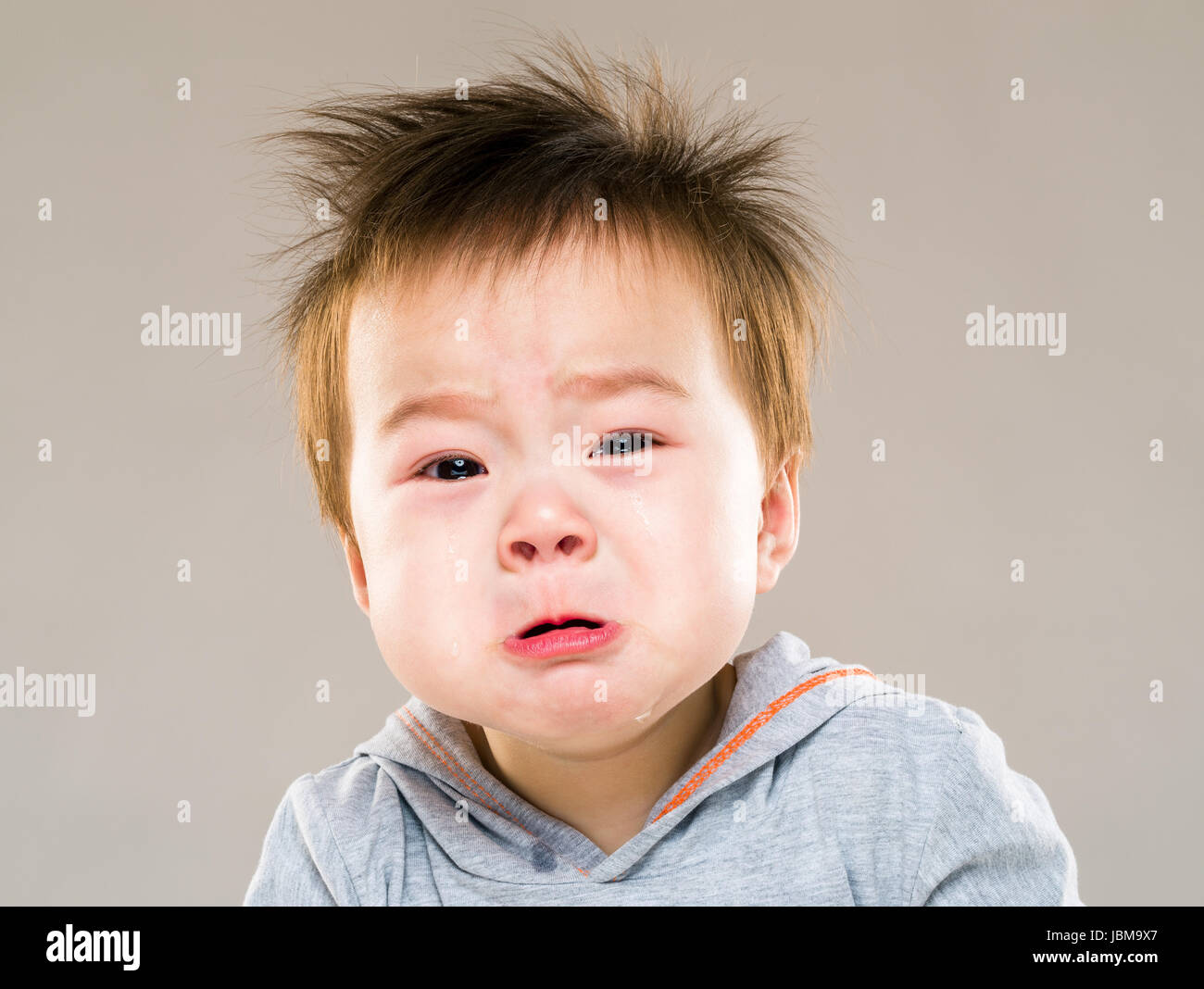 Baby bor crying Stock Photo - Alamy