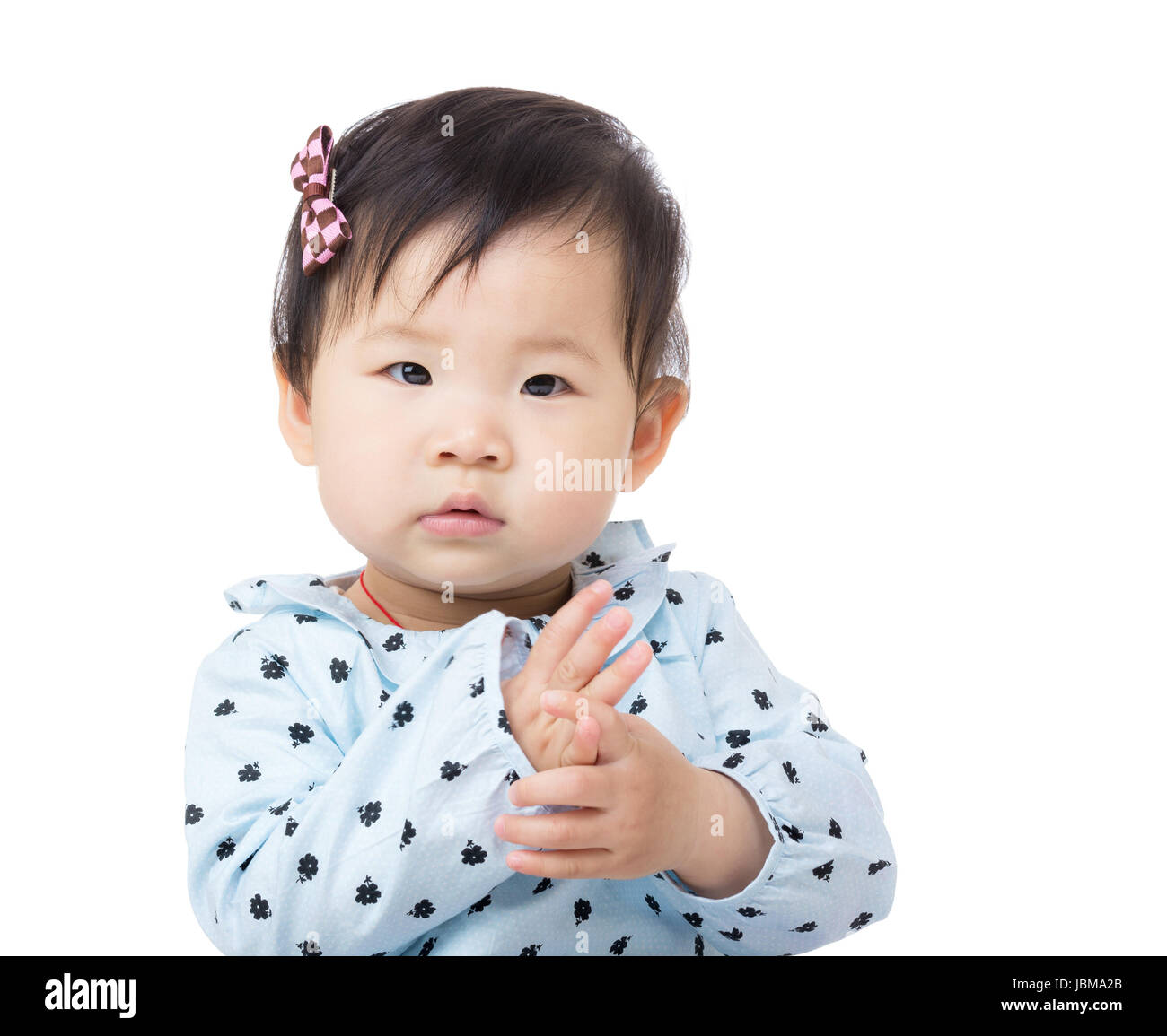 Asia baby girl clap hand Stock Photo - Alamy
