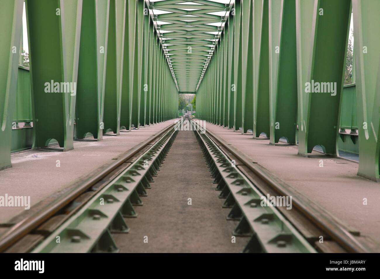 Railway bridge with steel grid structure Stock Photo - Alamy