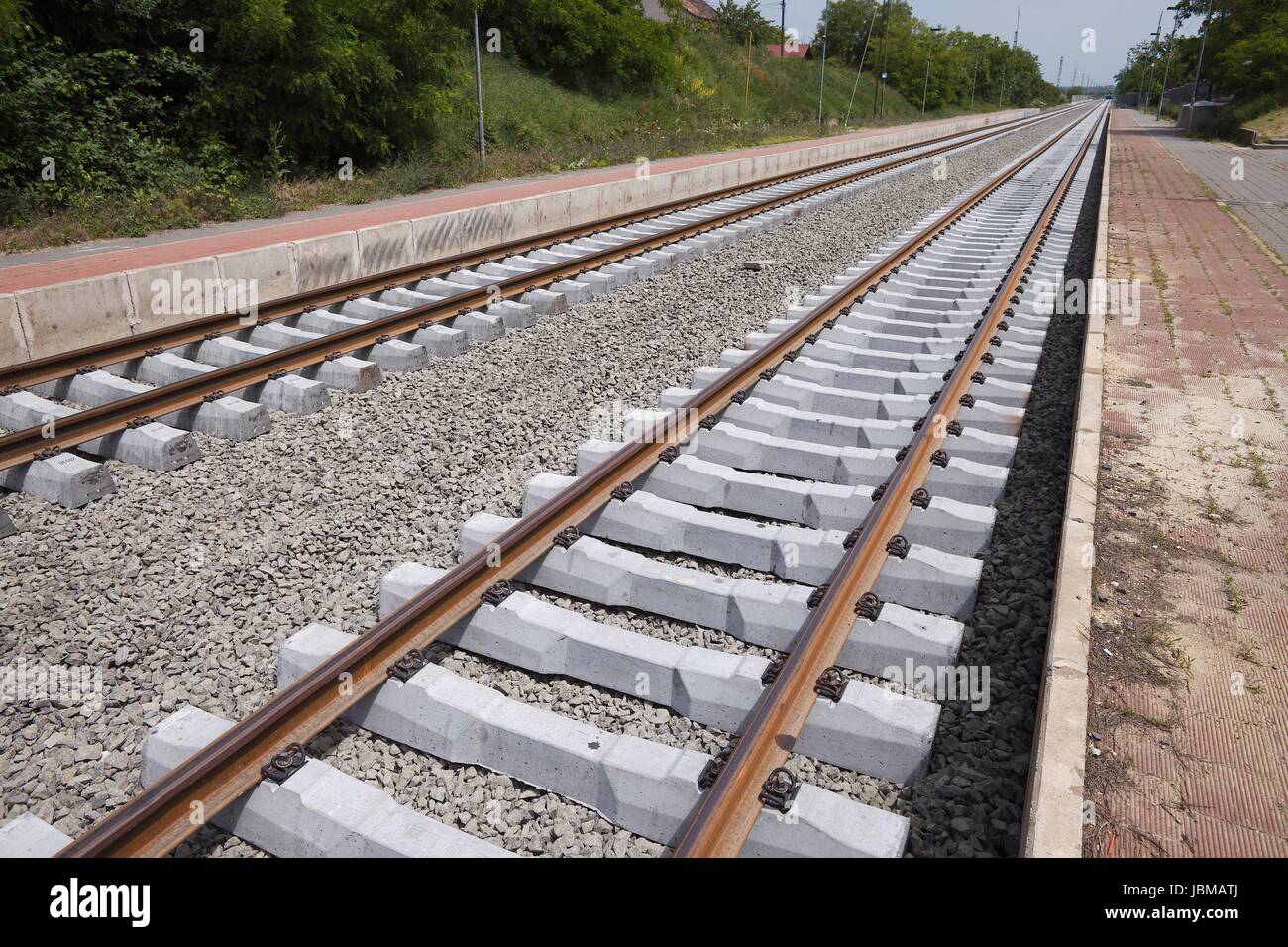 A pair of railway tracks under construction Stock Photo - Alamy