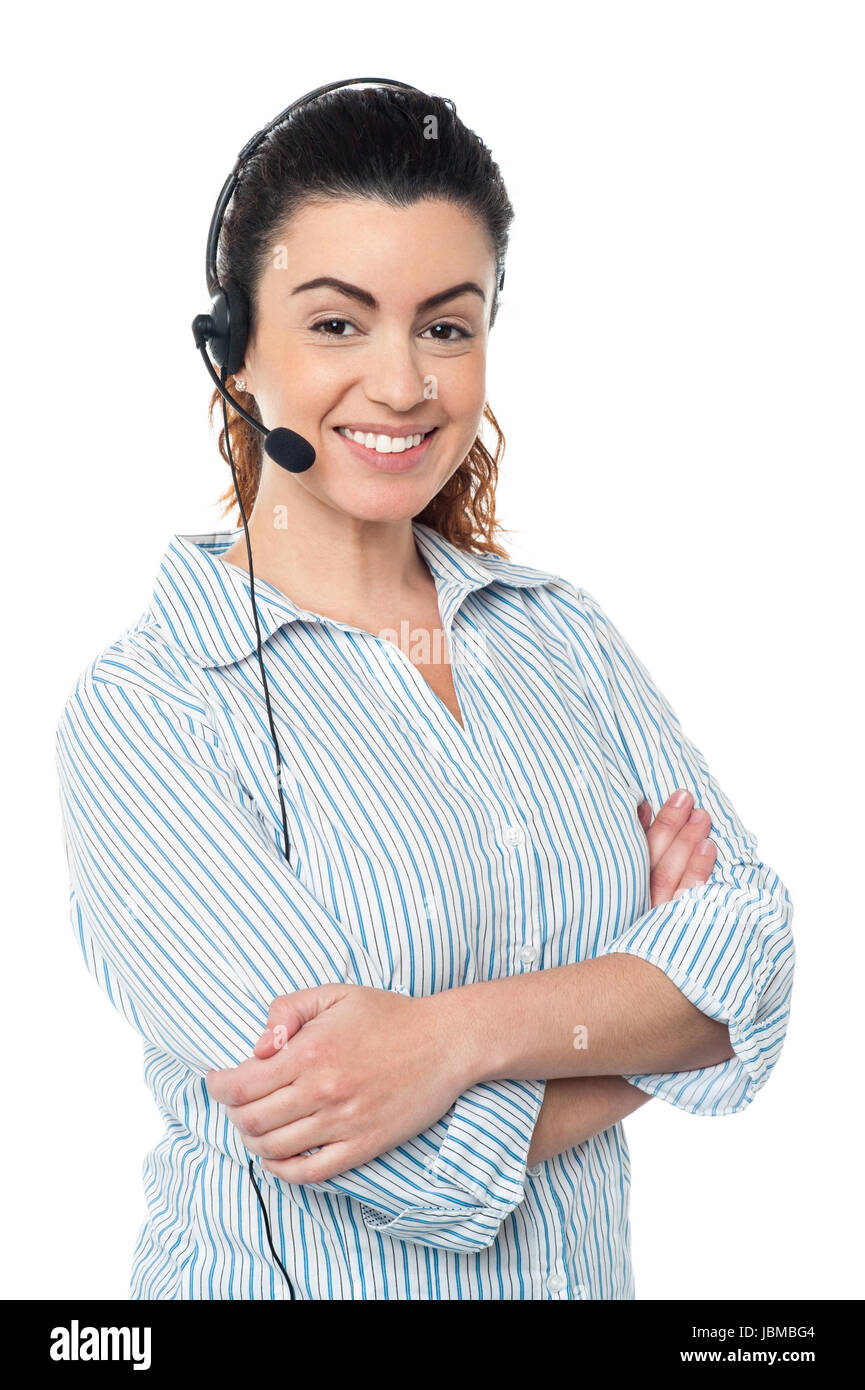 Smiling young call center woman with arms crossed Stock Photo - Alamy