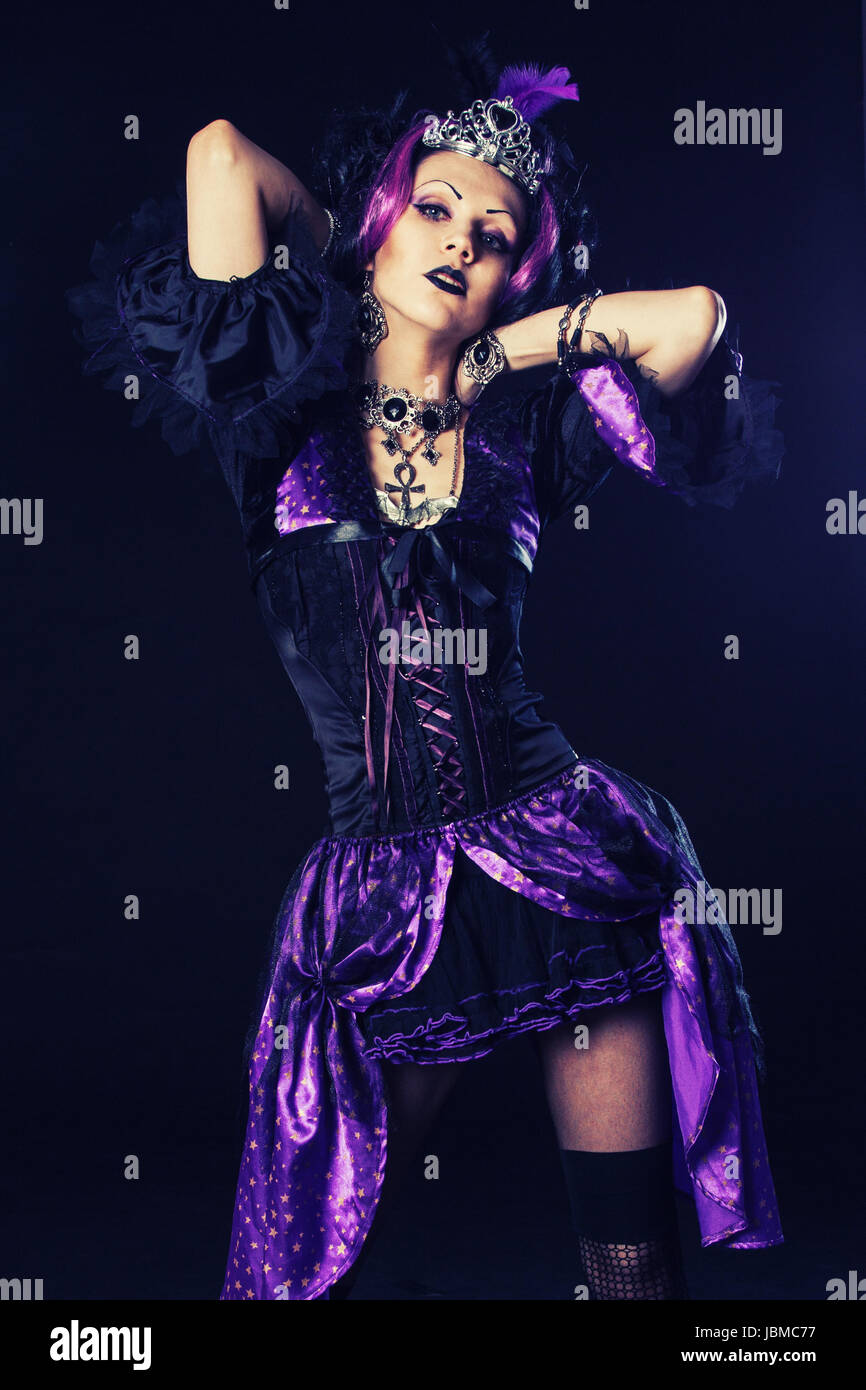 Young goth girl dressing a weird clothes in violet tones Stock Photo ...