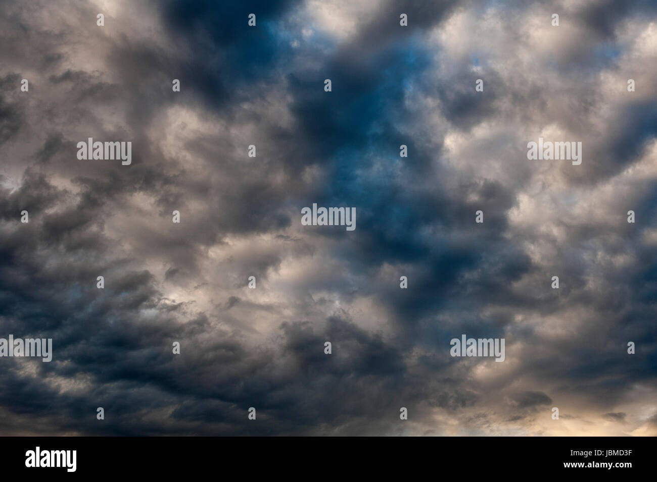 Altocumulus clouds with the treat of precipitation Stock Photo - Alamy