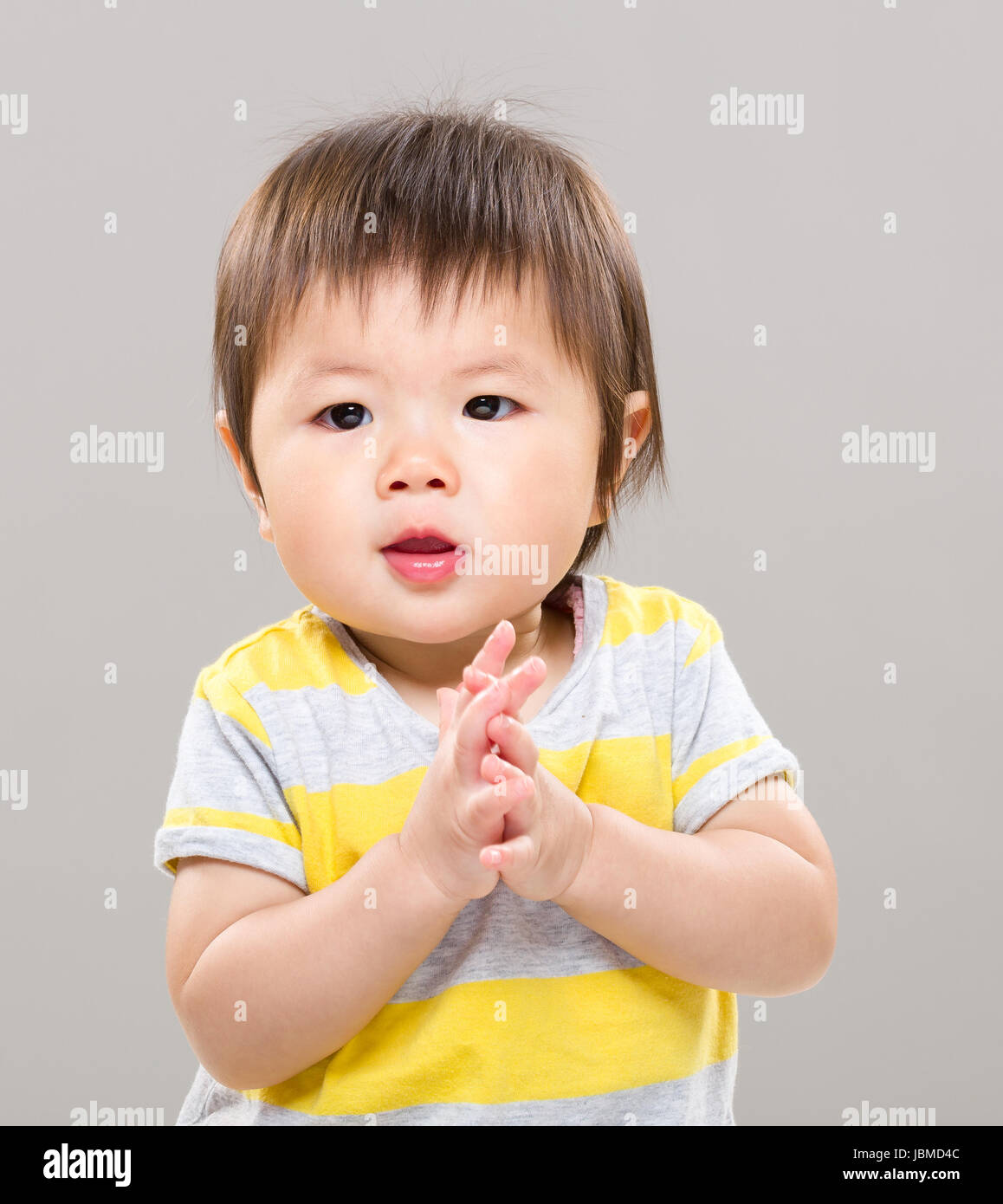 Baby clapping joy expression hi-res stock photography and images - Alamy