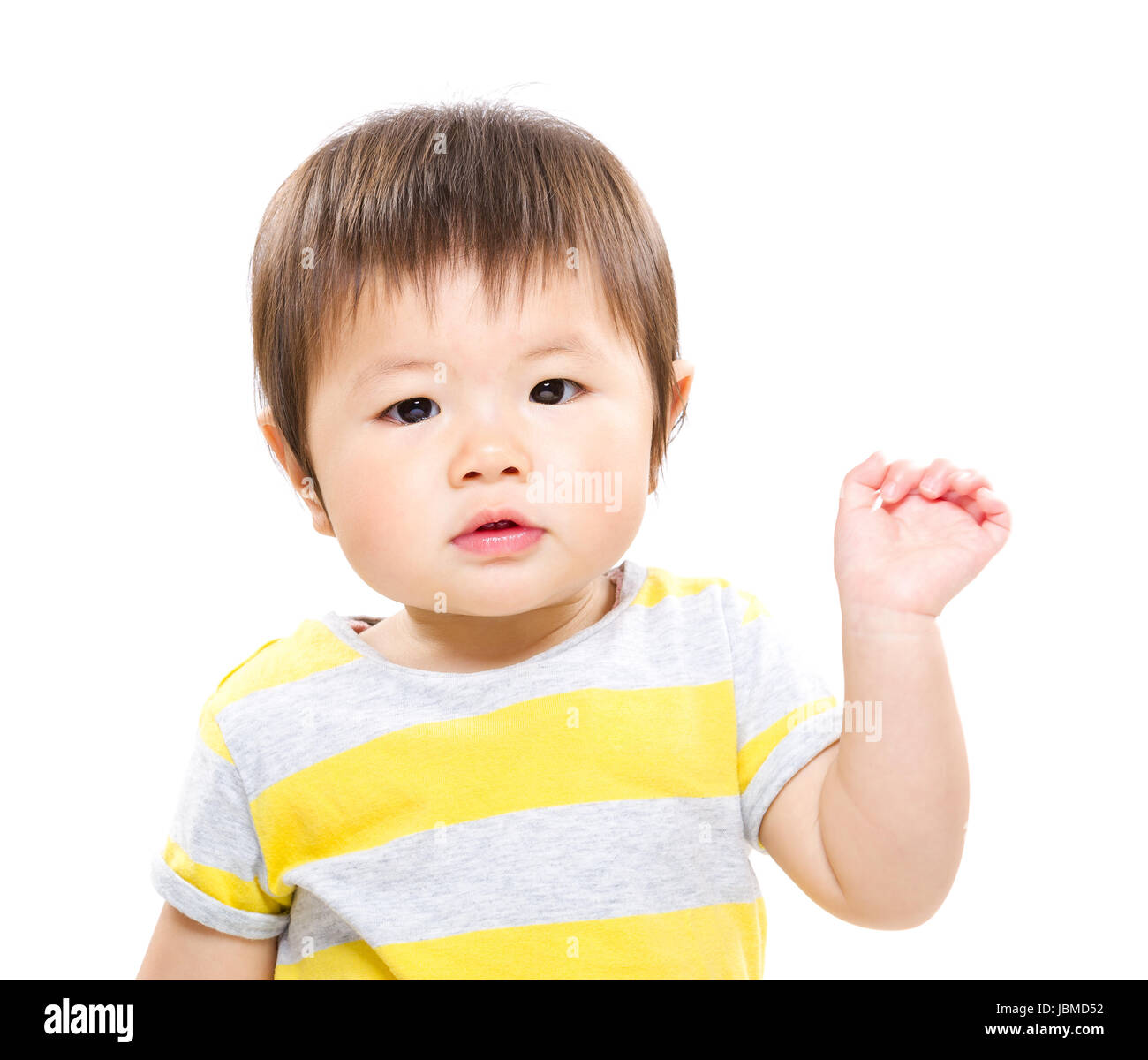 Baby girl raise hand up Stock Photo - Alamy