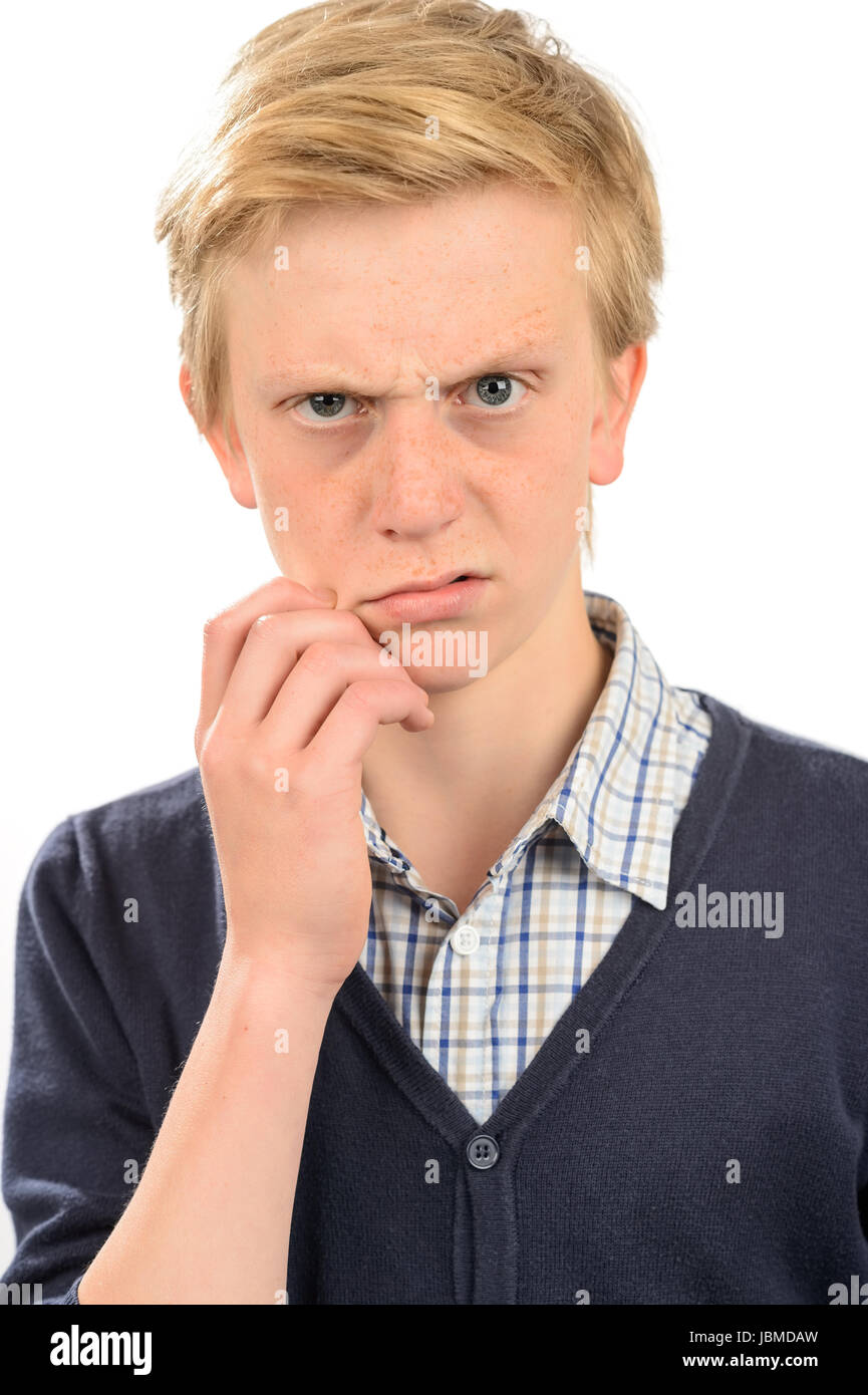 Aggressive teenage boy isolated over white background Stock Photo - Alamy