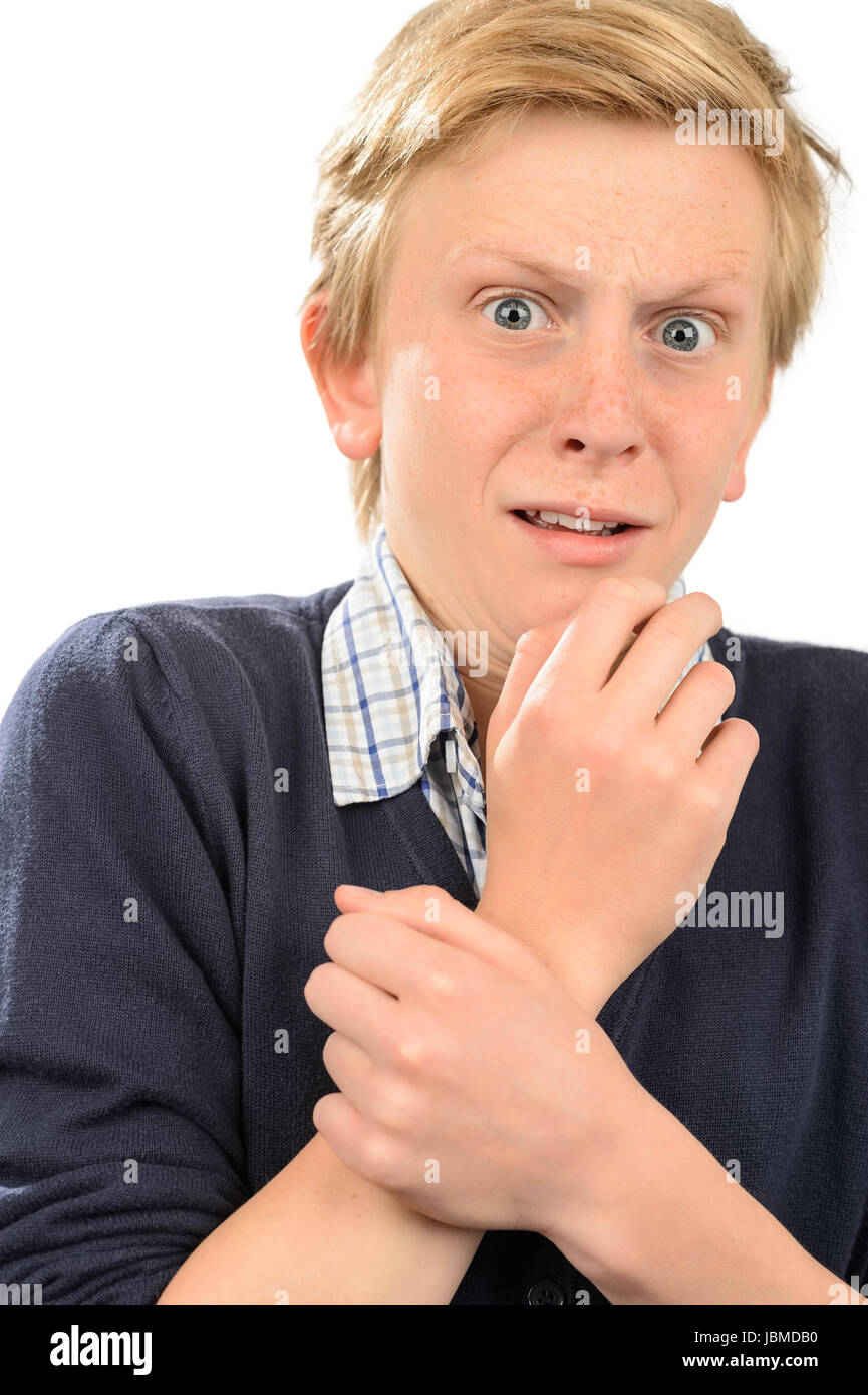 Scared teenage boy isolated against white background Stock Photo - Alamy