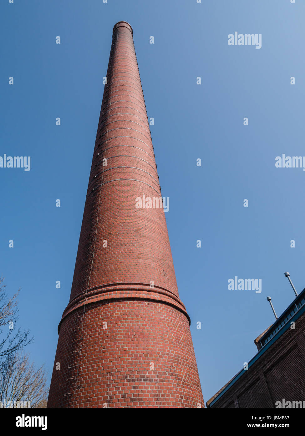 Red brick chimney of a historic steam pumping station in the ...