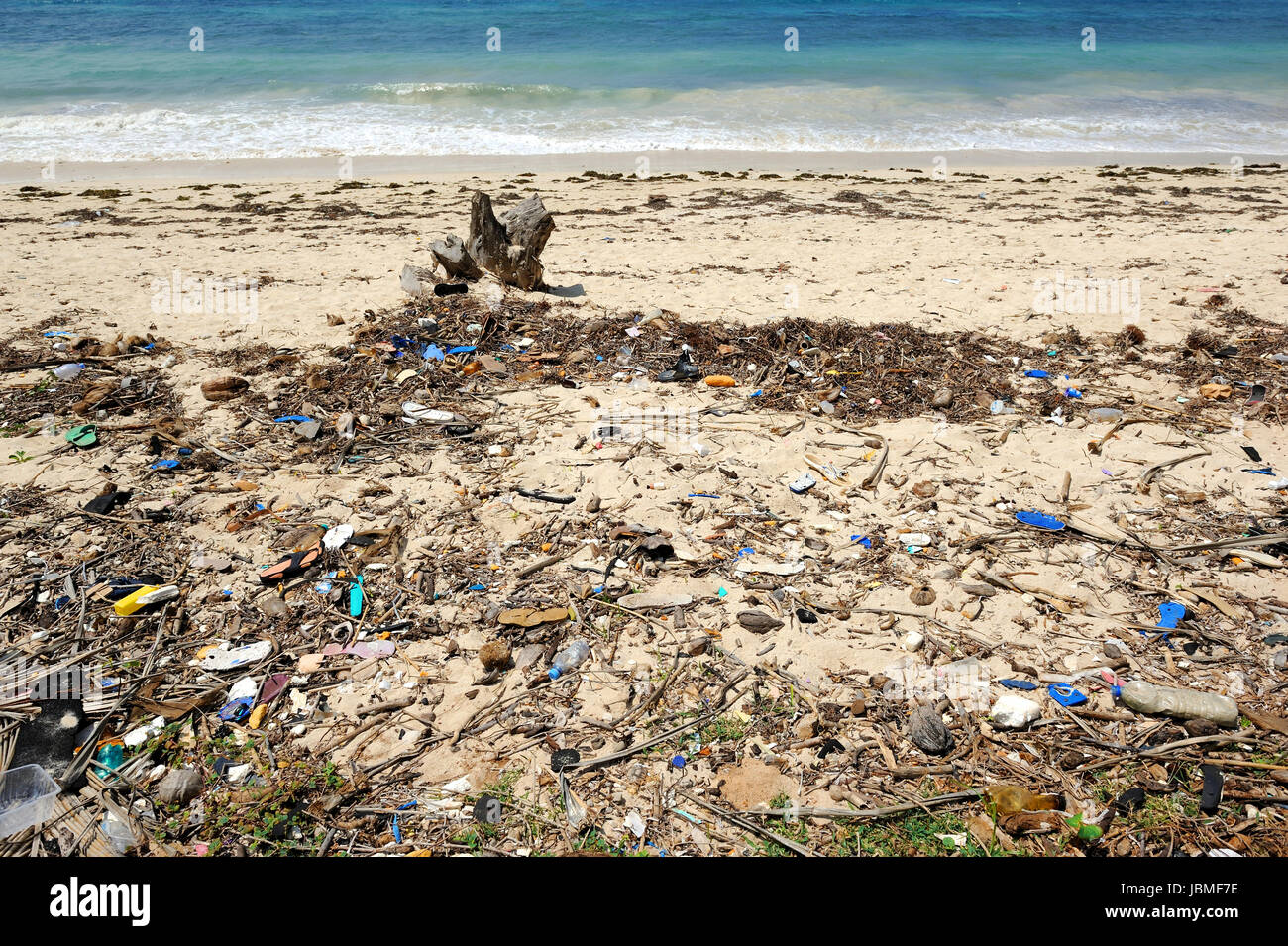 Trash on beach. Waste on the sands causes environmental pollution Stock ...