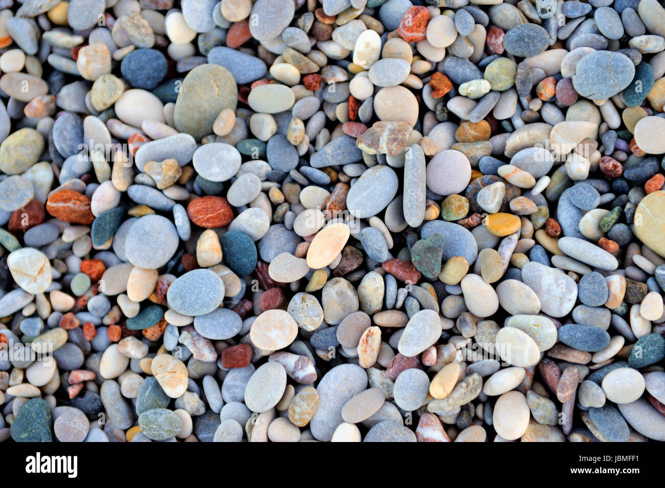 Colorful pebble stones texture by the beach Stock Photo - Alamy