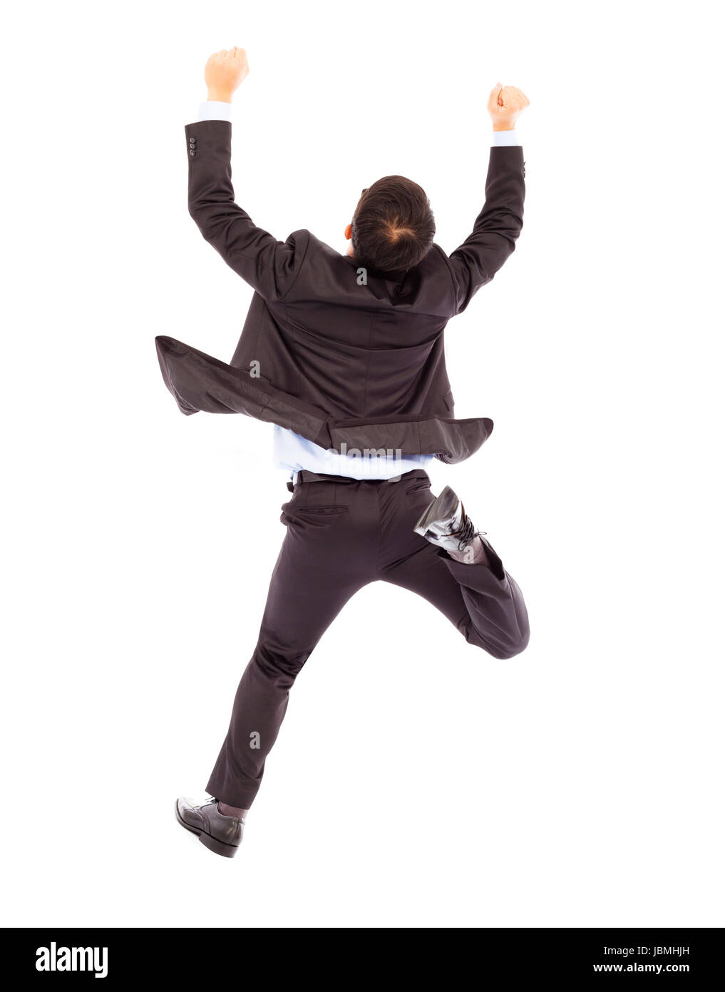 excited businessman raising hands while running happily Stock Photo - Alamy