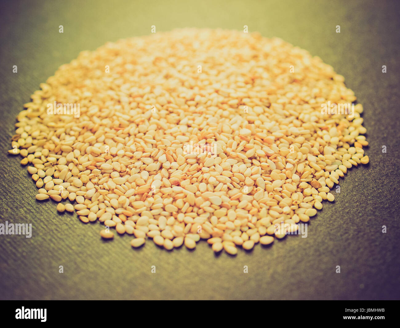 Vintage retro looking A heap of brown yellow sesame seeds Stock Photo ...