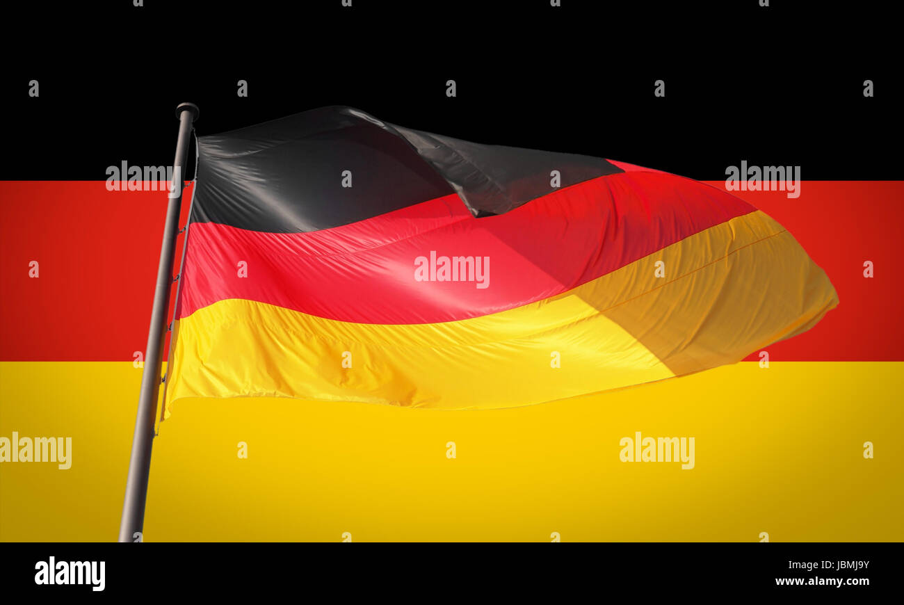 The national flag of Germany floating in the wind over a flat flag ...