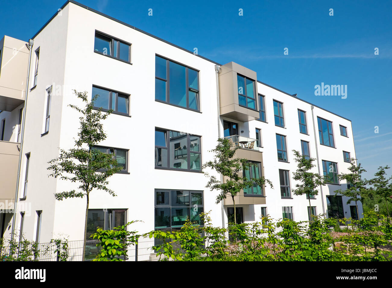 modern white apartment building Stock Photo - Alamy