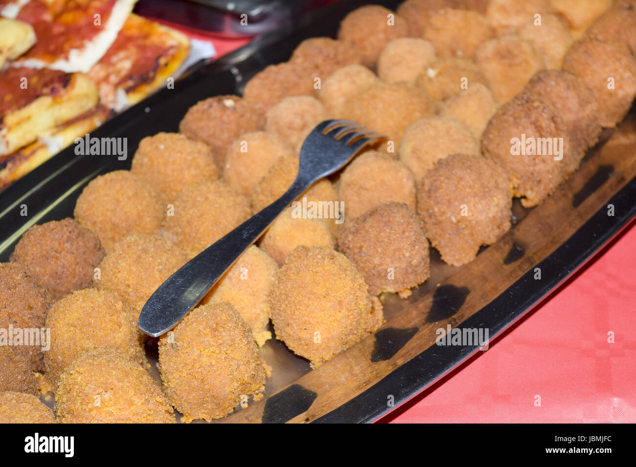 wedding buffet: a tray of rice croquettes Stock Photo - Alamy