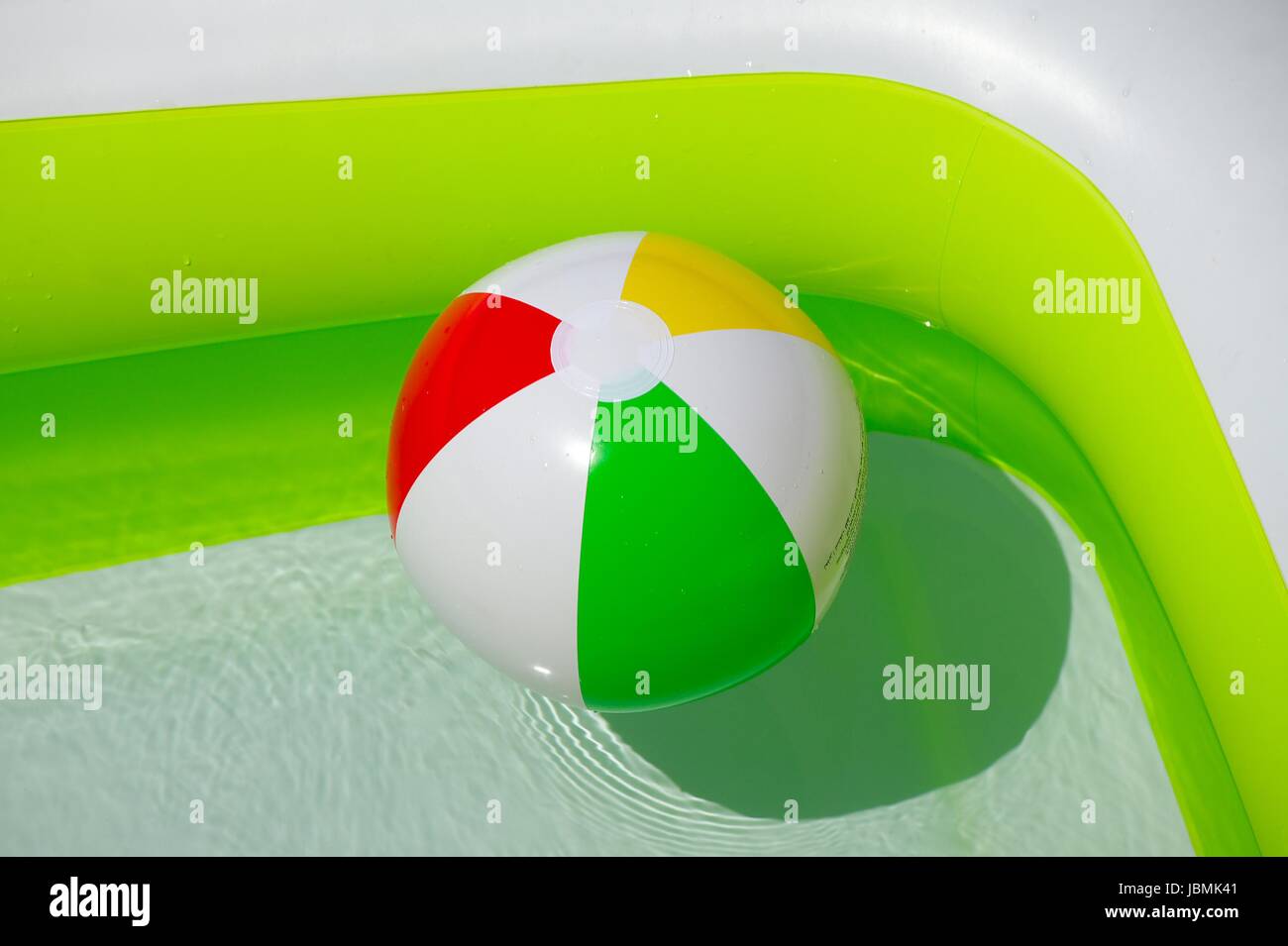 Rubber ball in a swimming pool Stock Photo - Alamy