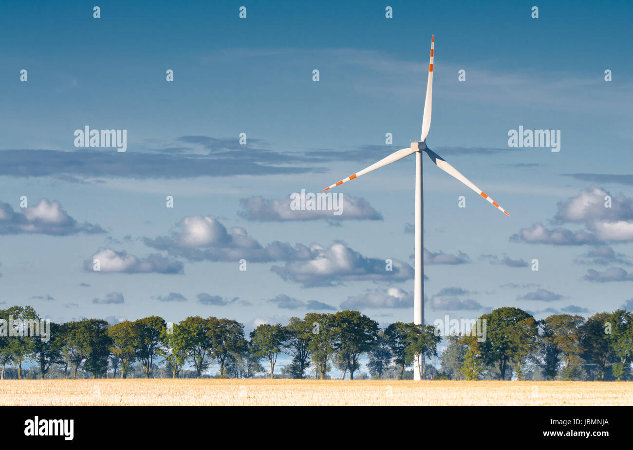 Wind turbine farm on rural terrain Stock Photo - Alamy