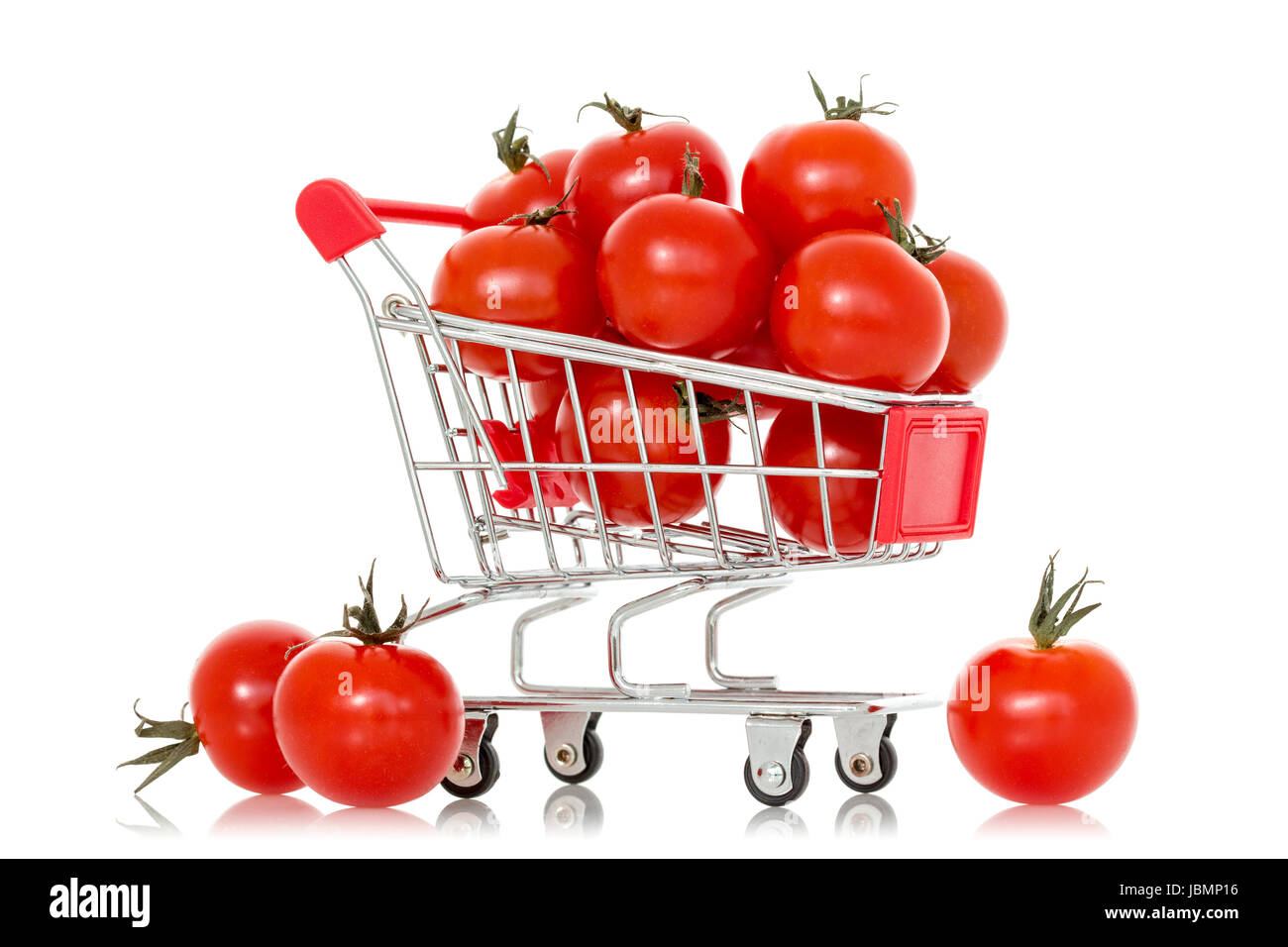 Shopping cart full of tomatoes. Isolated on white background Stock ...