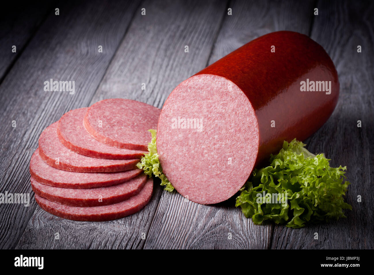 Fresh polish salami sausage slices. Mest composition taken on rustic ...