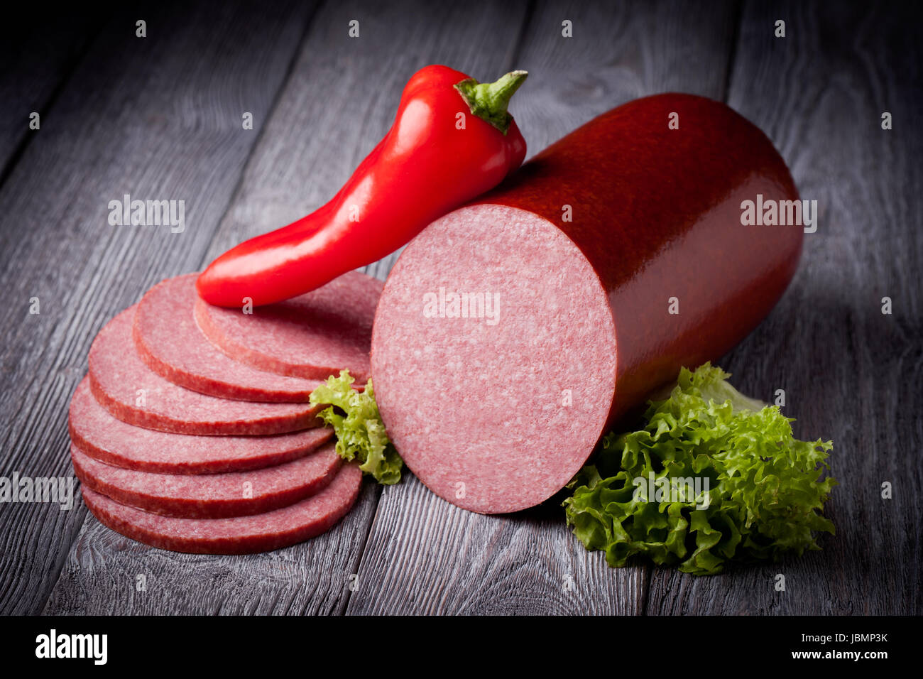 Fresh polish salami sausage slices. Mest composition taken on rustic ...
