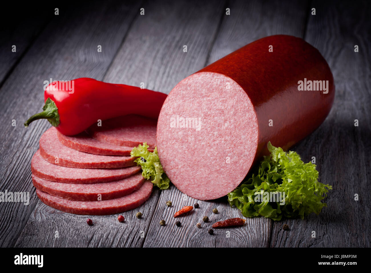 Fresh polish salami sausage slices. Mest composition taken on rustic ...