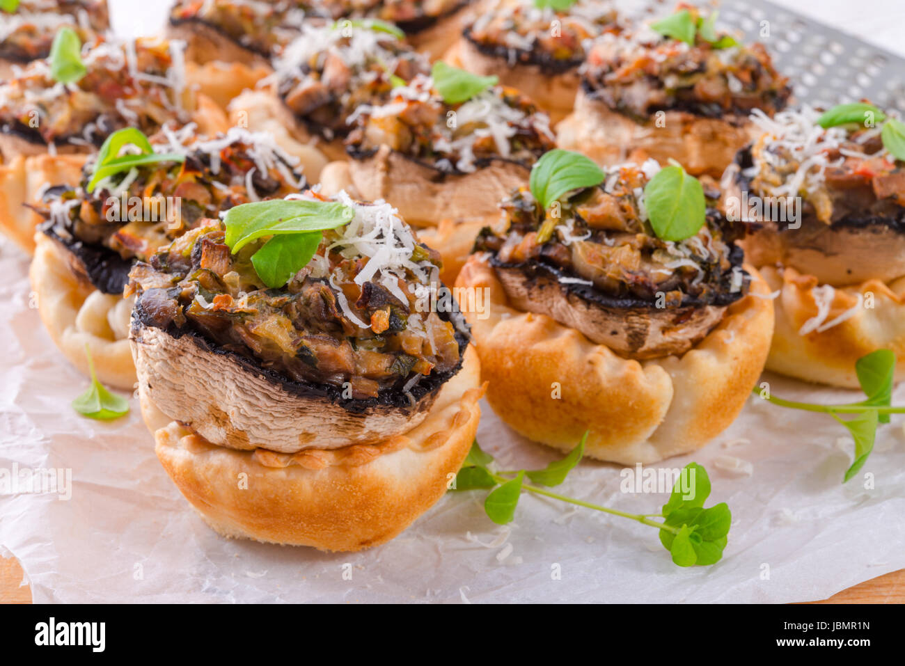 Champignons with puff pastry Stock Photo - Alamy