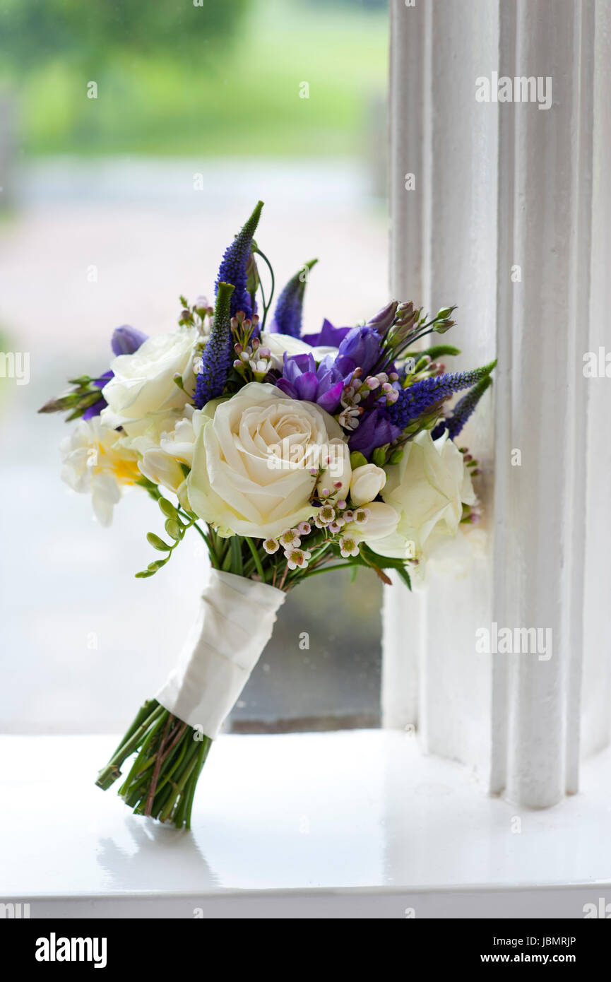 wedding bouquet of white and purple roses Stock Photo - Alamy