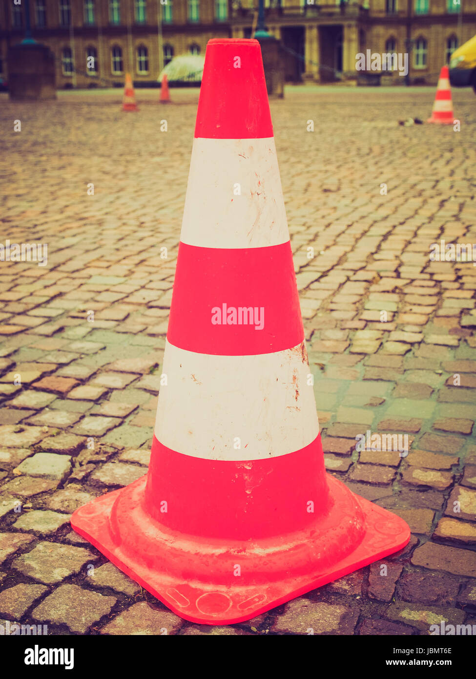 Vintage retro looking Traffic cone used in street road works Stock ...
