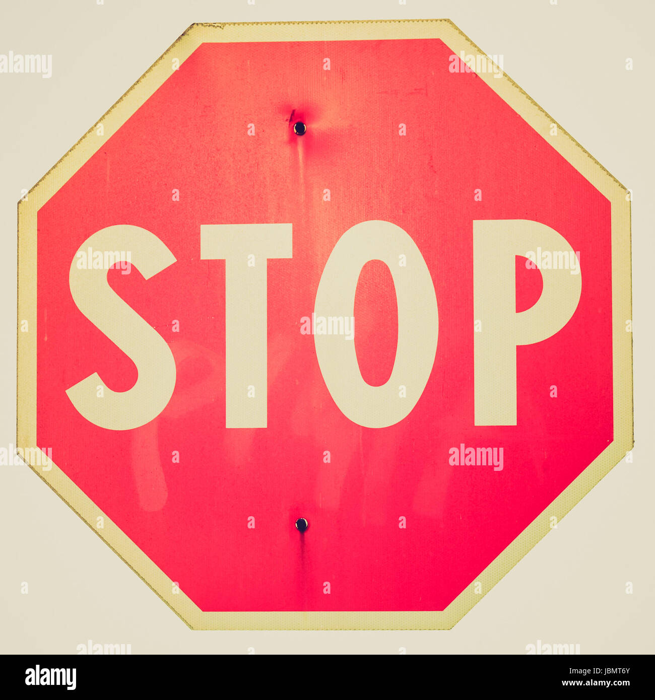 Vintage retro looking Stop traffic sign isolated on white background ...