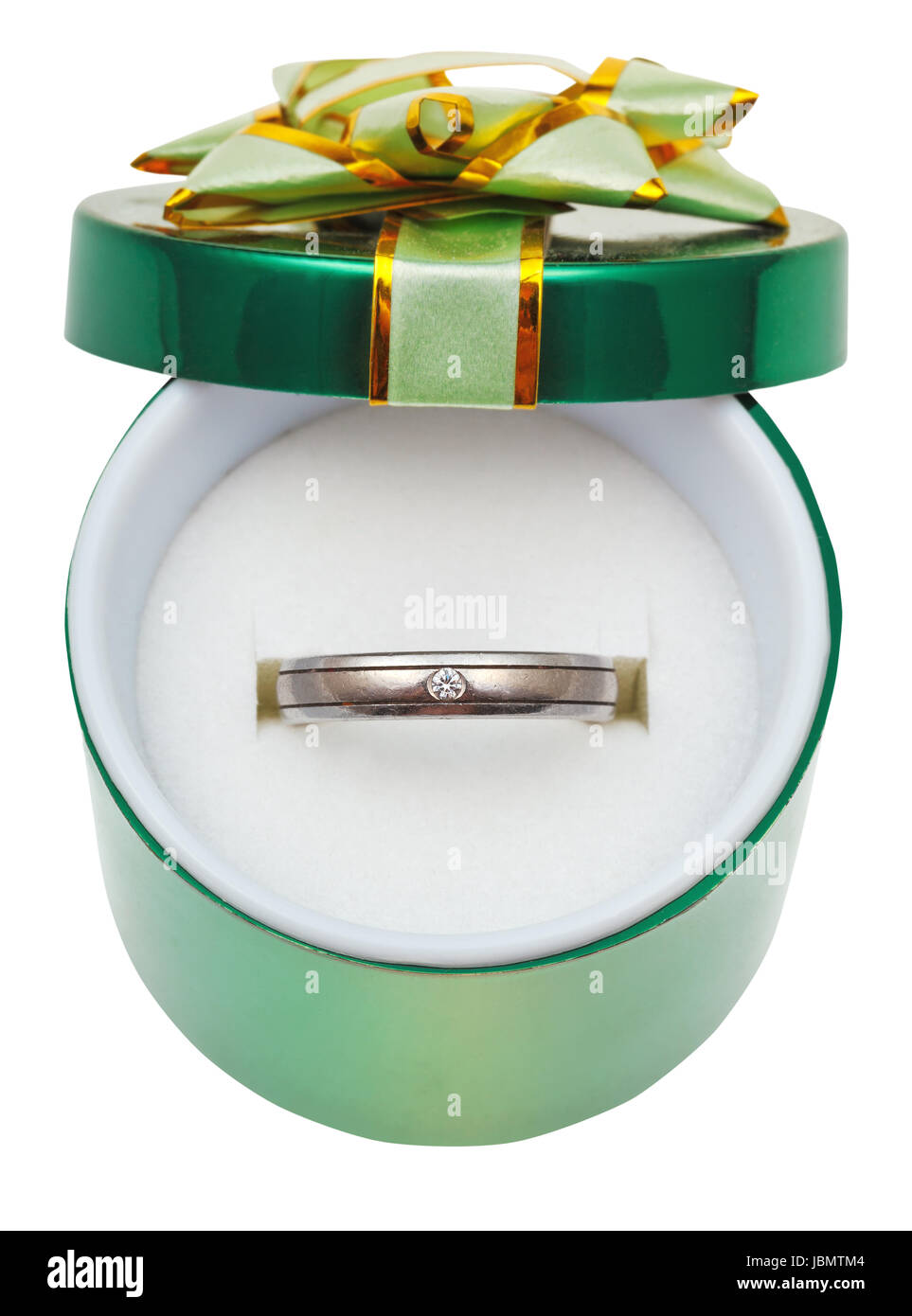 decorated green box with wedding platinum ring isolated on white ...