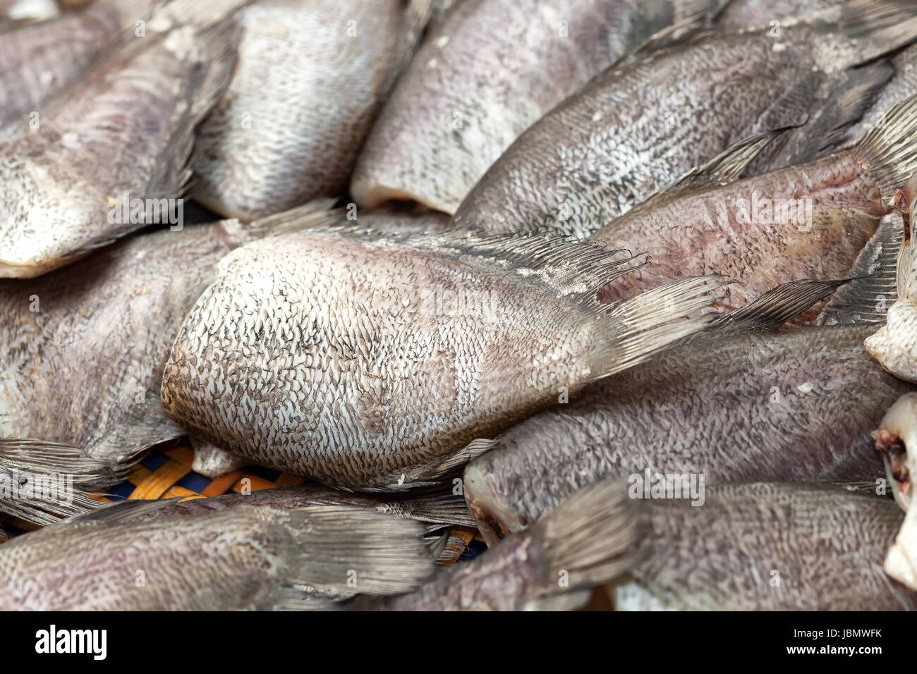 Salted gourami fish at Asian market Stock Photo - Alamy