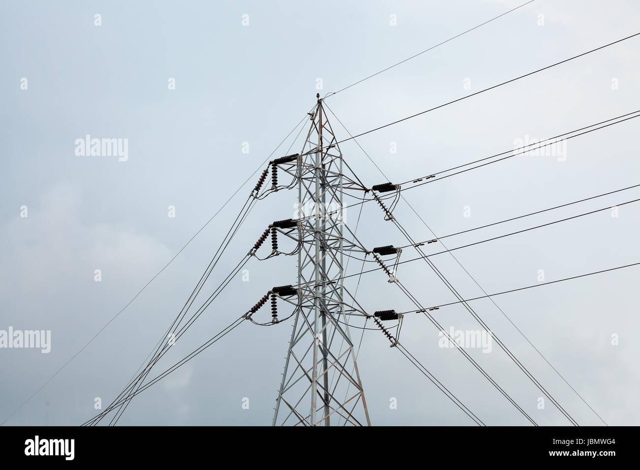 High voltage electricity post Stock Photo - Alamy