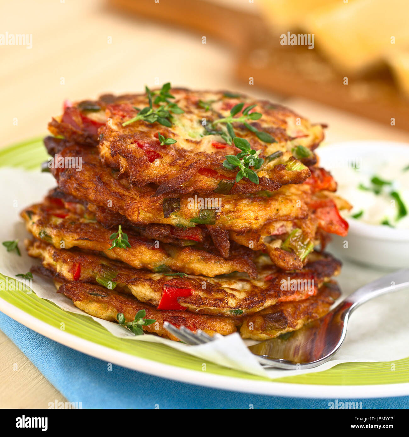 Vegetable and egg fritter made of zucchini, red bell pepper, eggs ...