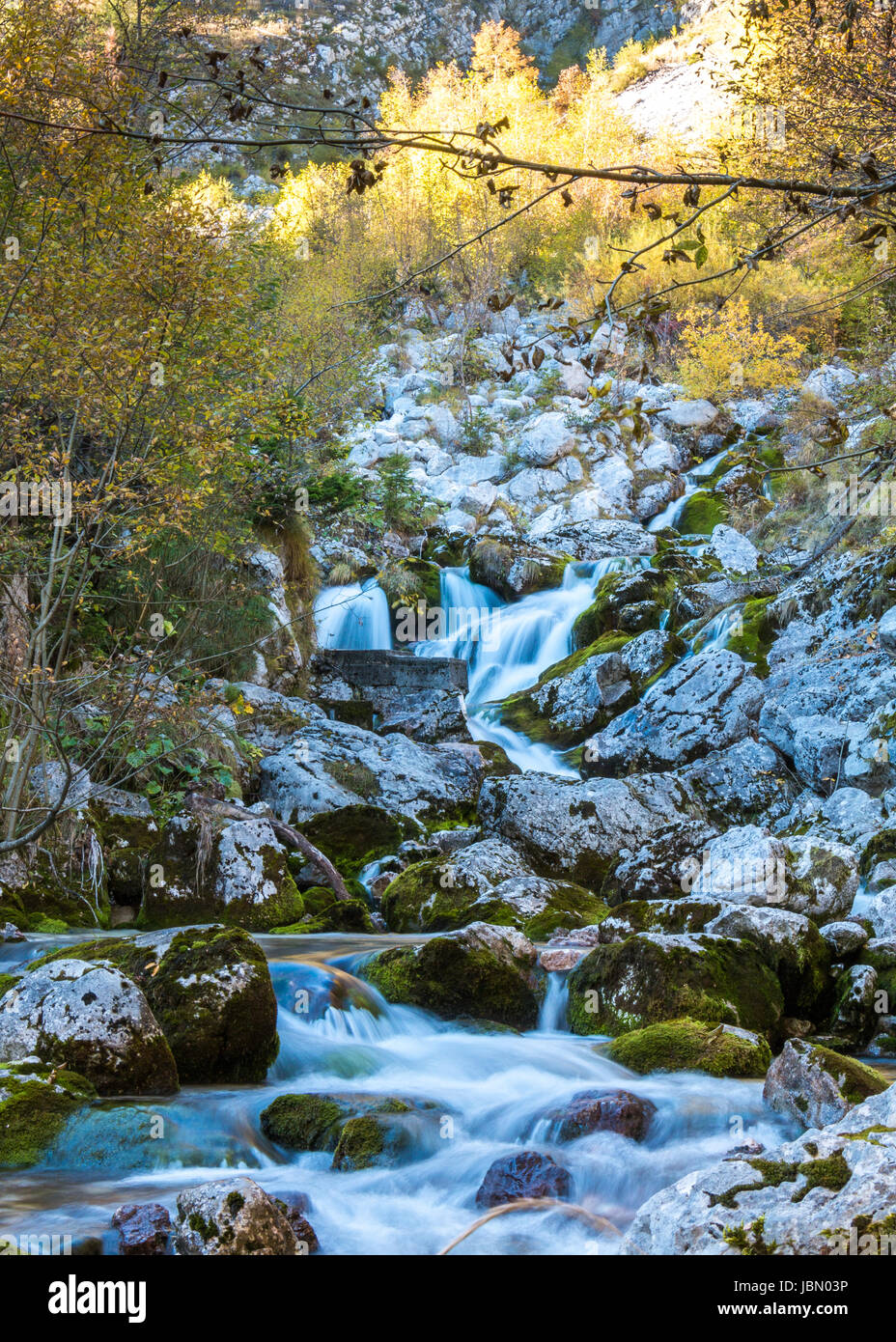 The Soca / Isonzo River near the source flowing over rocks Stock Photo ...