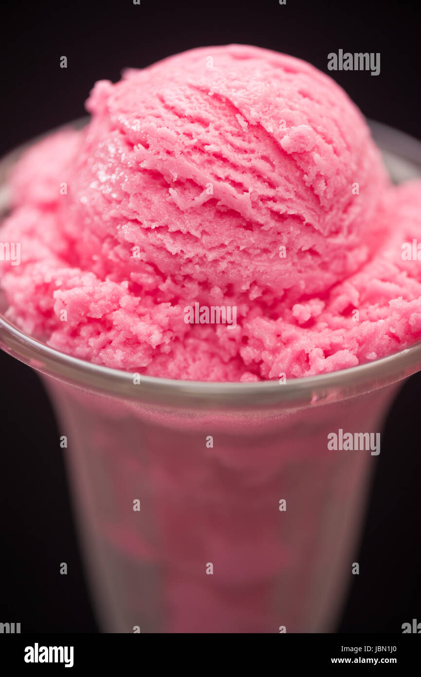 Raspberry ice cream in a tall glass Stock Photo - Alamy