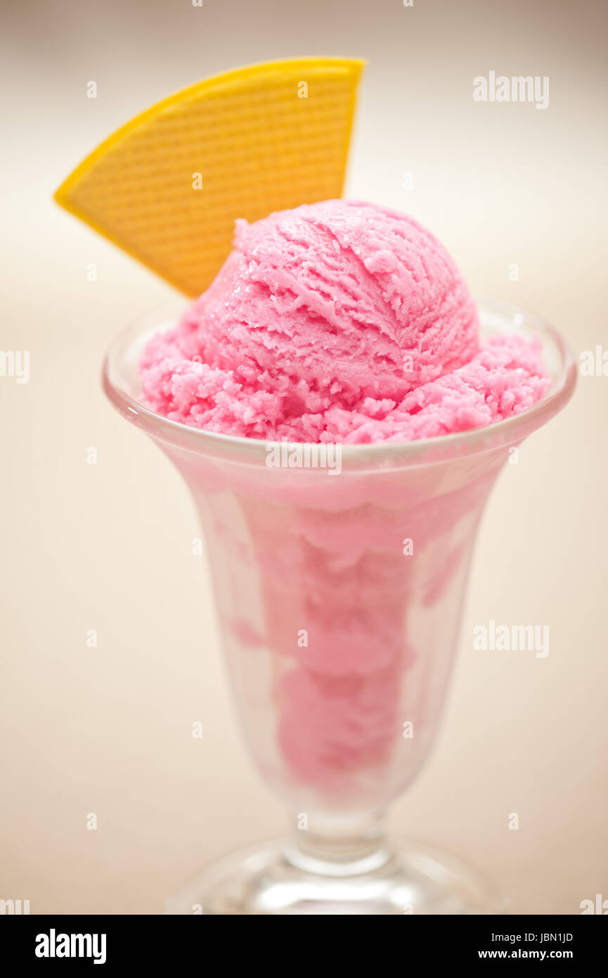 Raspberry ice cream in a tall glass Stock Photo - Alamy