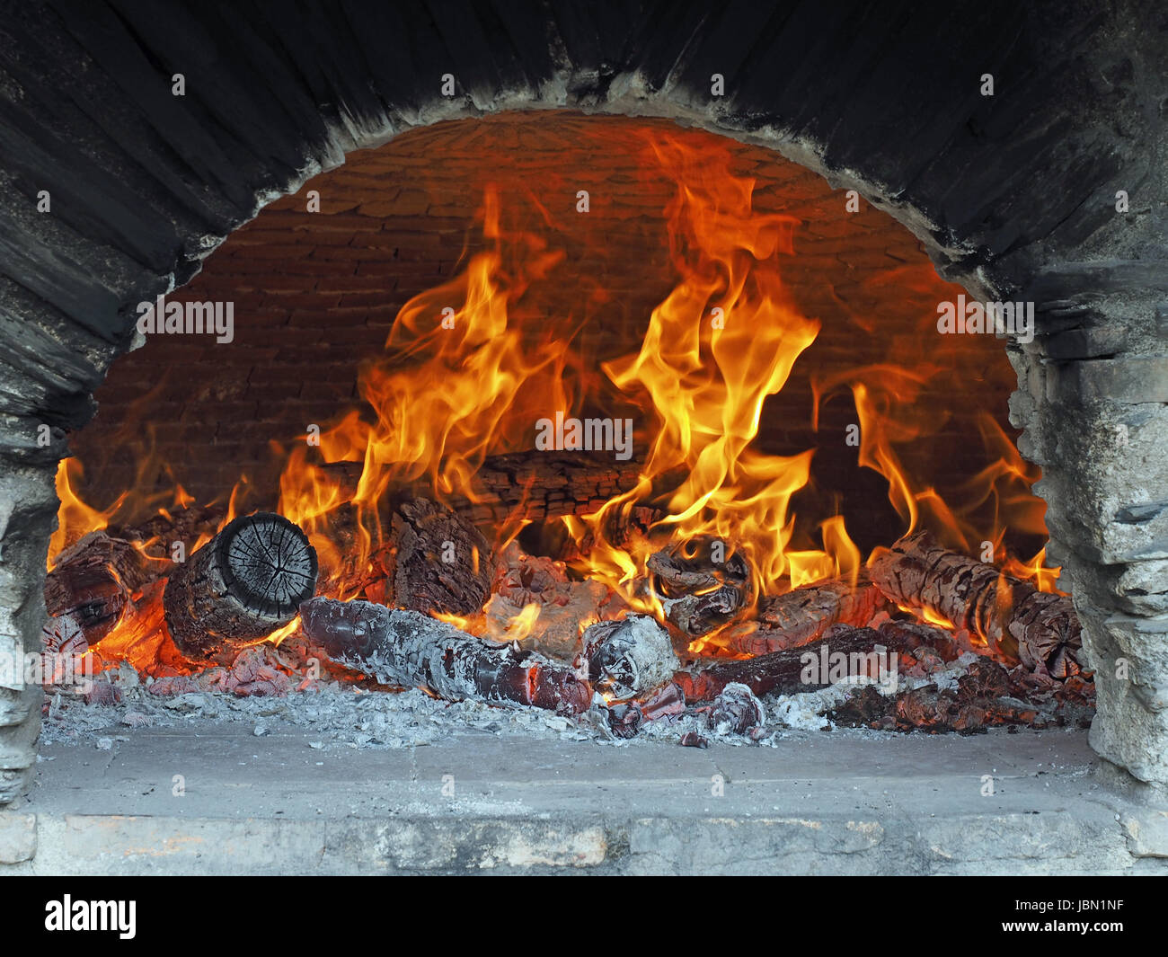 wood burning in a brick domed ceiling bread oven Stock Photo - Alamy