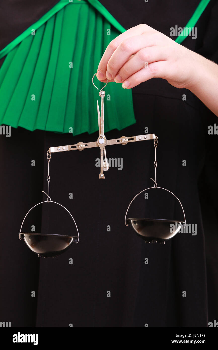 Female hand holding scale justice hi-res stock photography and images ...