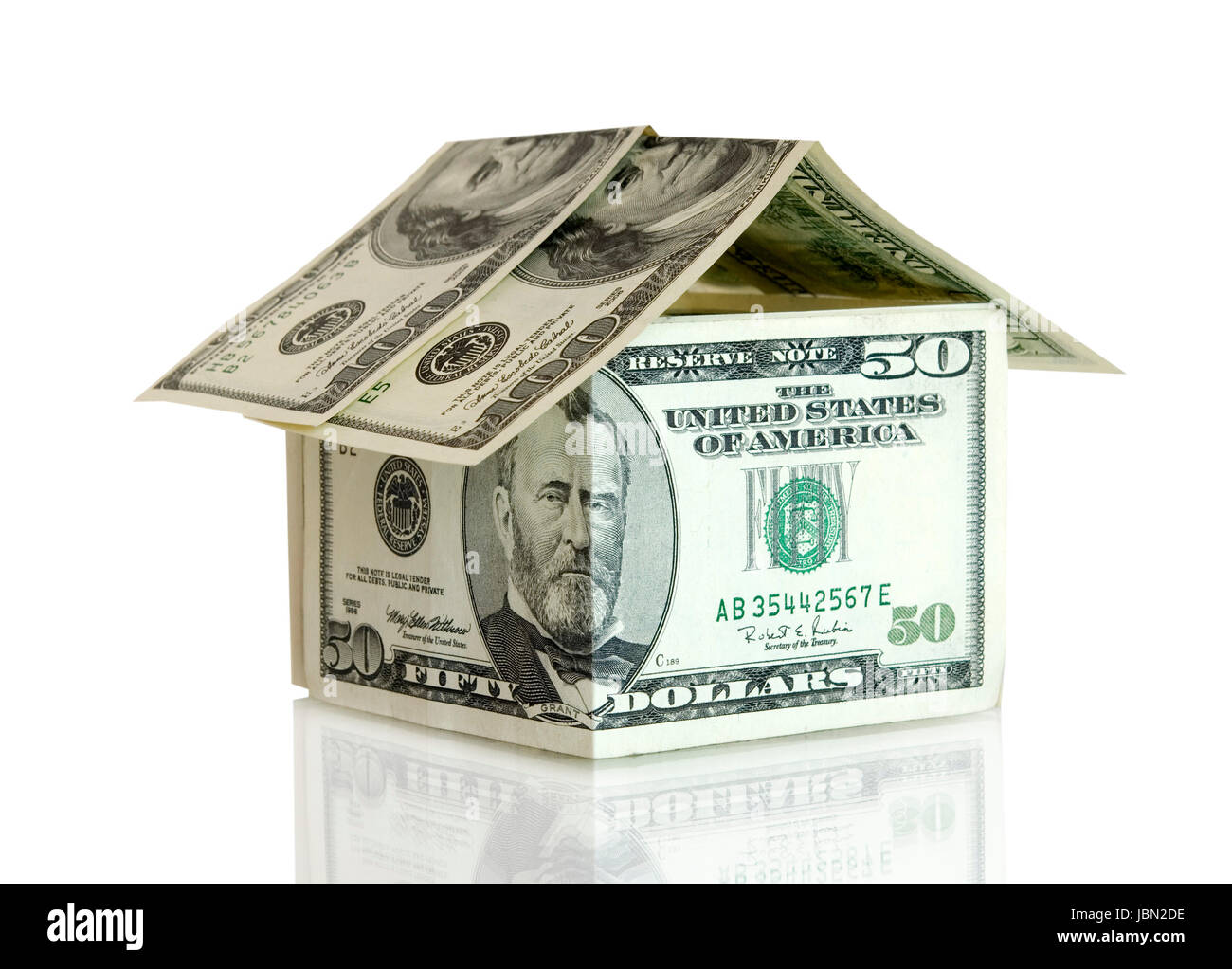 Money house on white background Stock Photo - Alamy