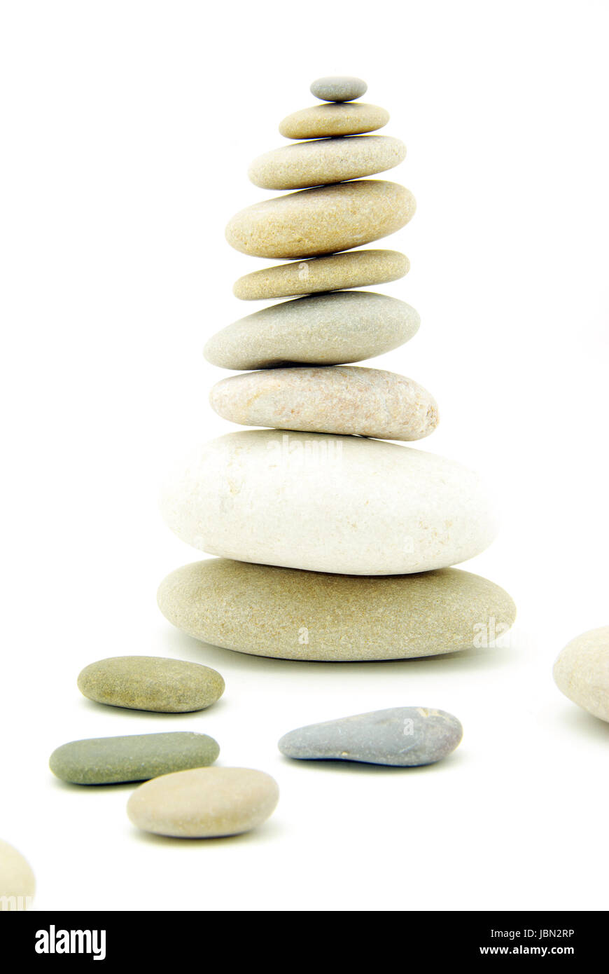 Stack of balanced stones on a white background Stock Photo - Alamy