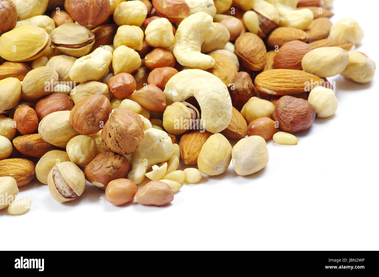 Assorted mixed nuts on white background Stock Photo - Alamy