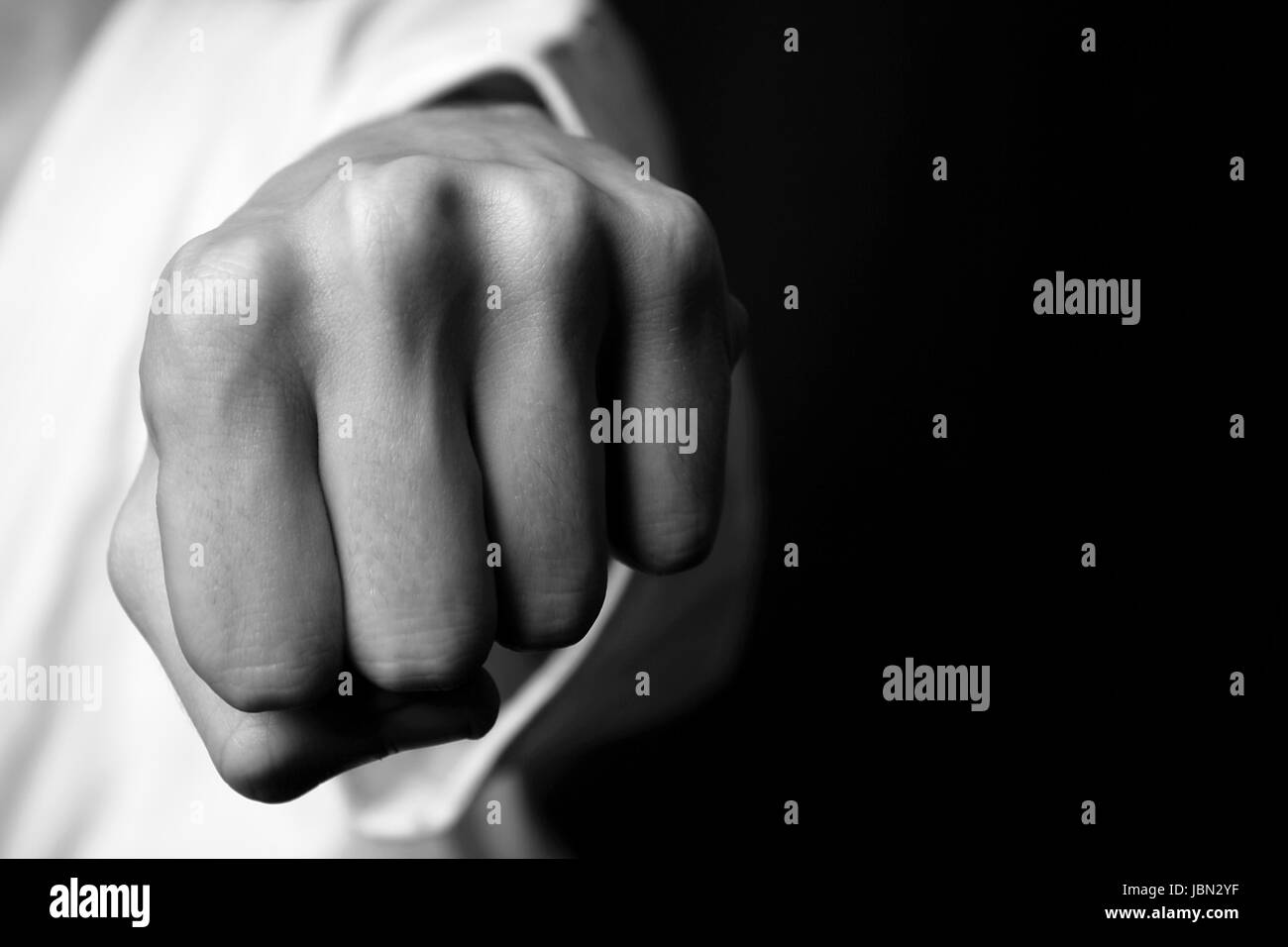 Hand punch Black and White Stock Photos & Images - Alamy