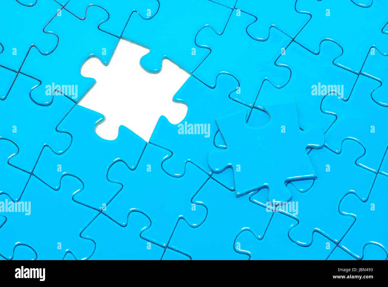 blue puzzles for background. business concept Stock Photo - Alamy
