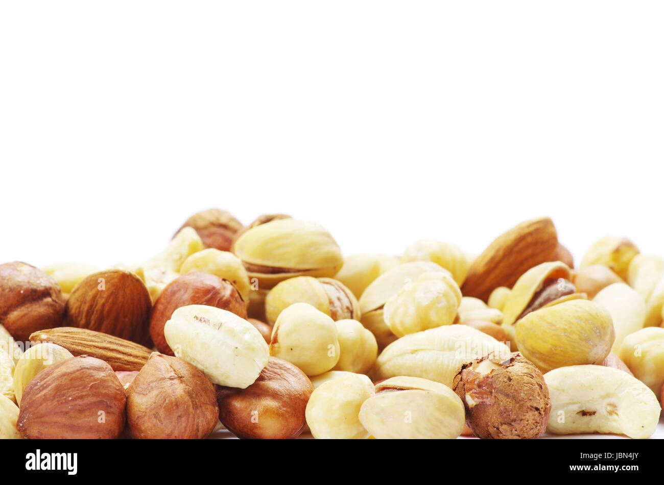 Assorted mixed nuts on white background Stock Photo - Alamy