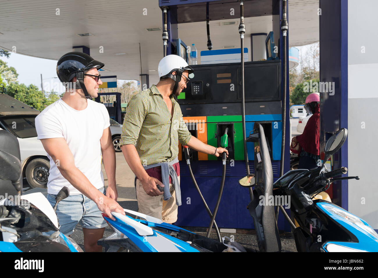 Man Couple On Gas Station Fuel Motor Bike, Happy Smiling Guys ...