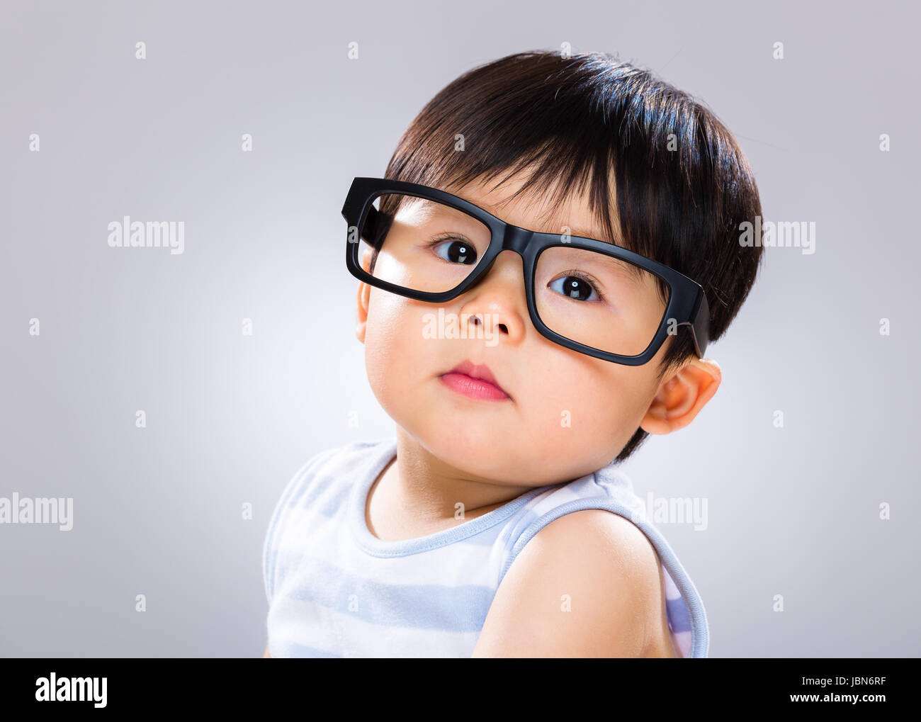 Baby student wear glasses Stock Photo - Alamy