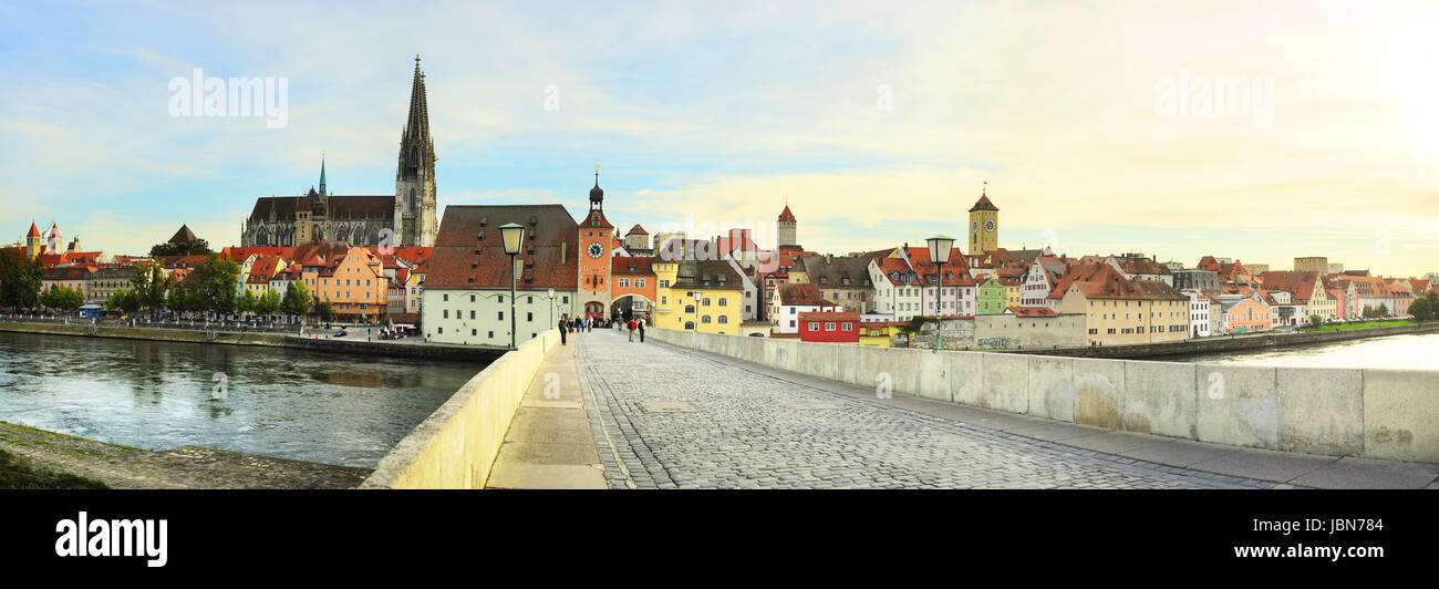 Panoramic view of Regensburg across the old stone bridge. Germany Stock ...