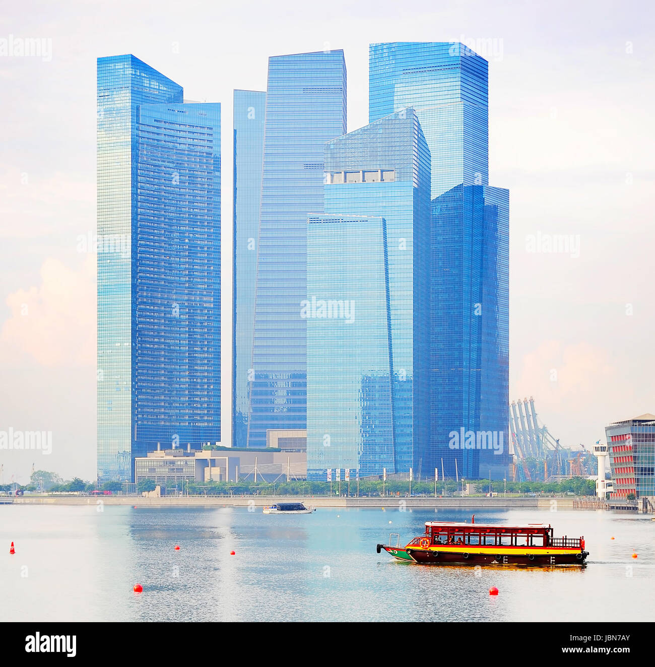 Modern office building reflected in Singapore river Stock Photo - Alamy