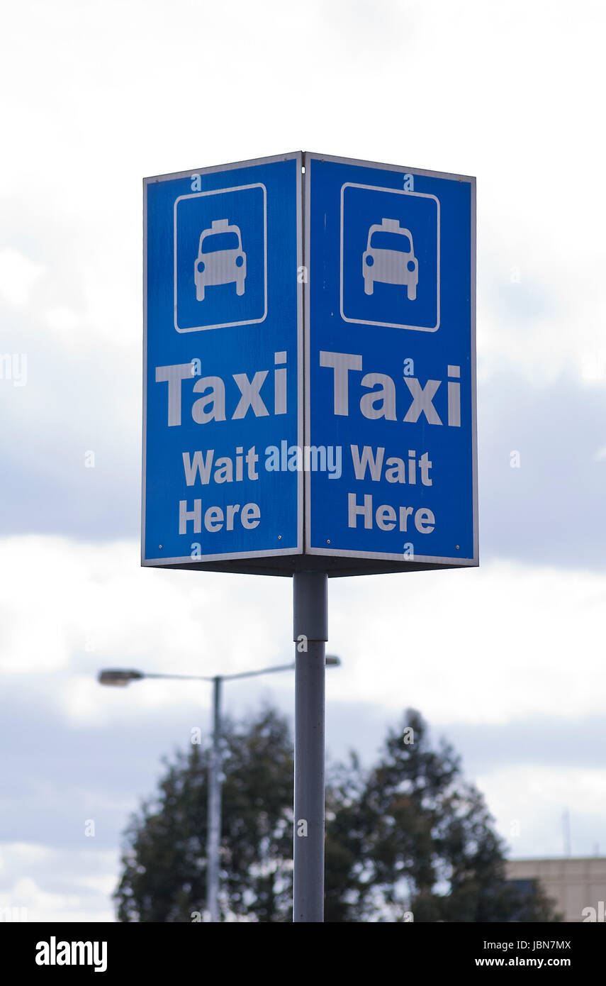Taxi blue rank sign Stock Photo - Alamy
