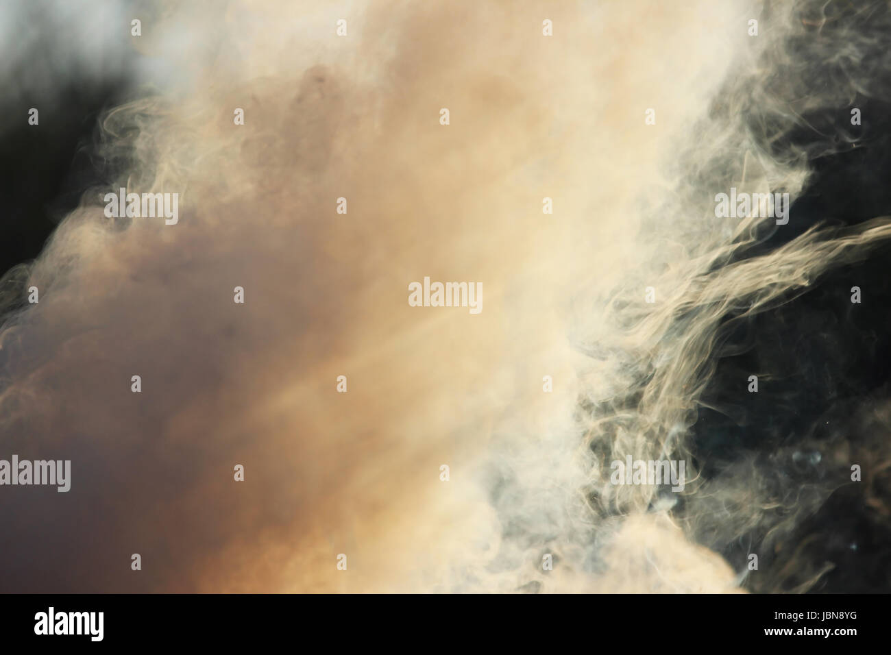 White smoke from the fire where wet boards and sawdust lie Stock Photo ...